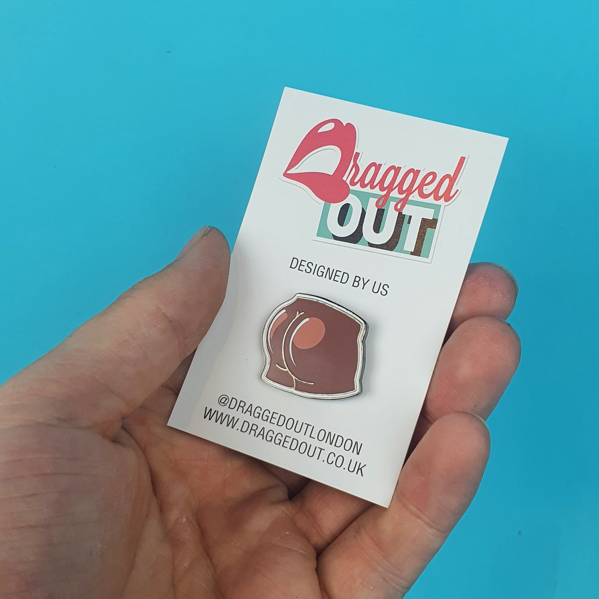 Chocolate Booty Pin Badge Dragged Out
