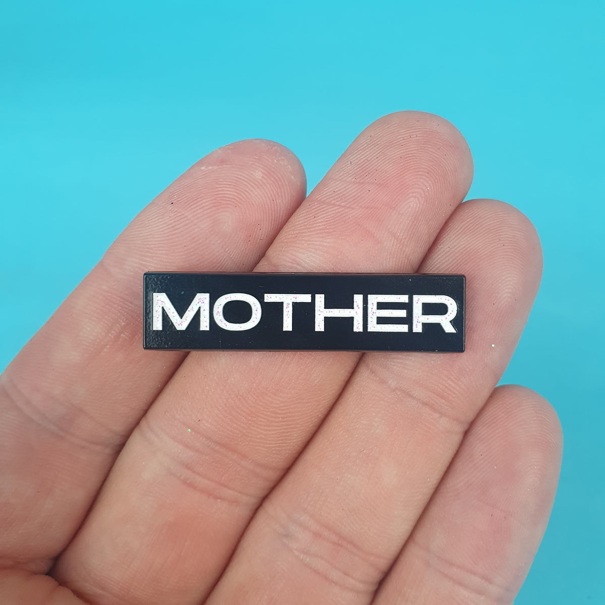 Mother Pin Badge Dragged Out