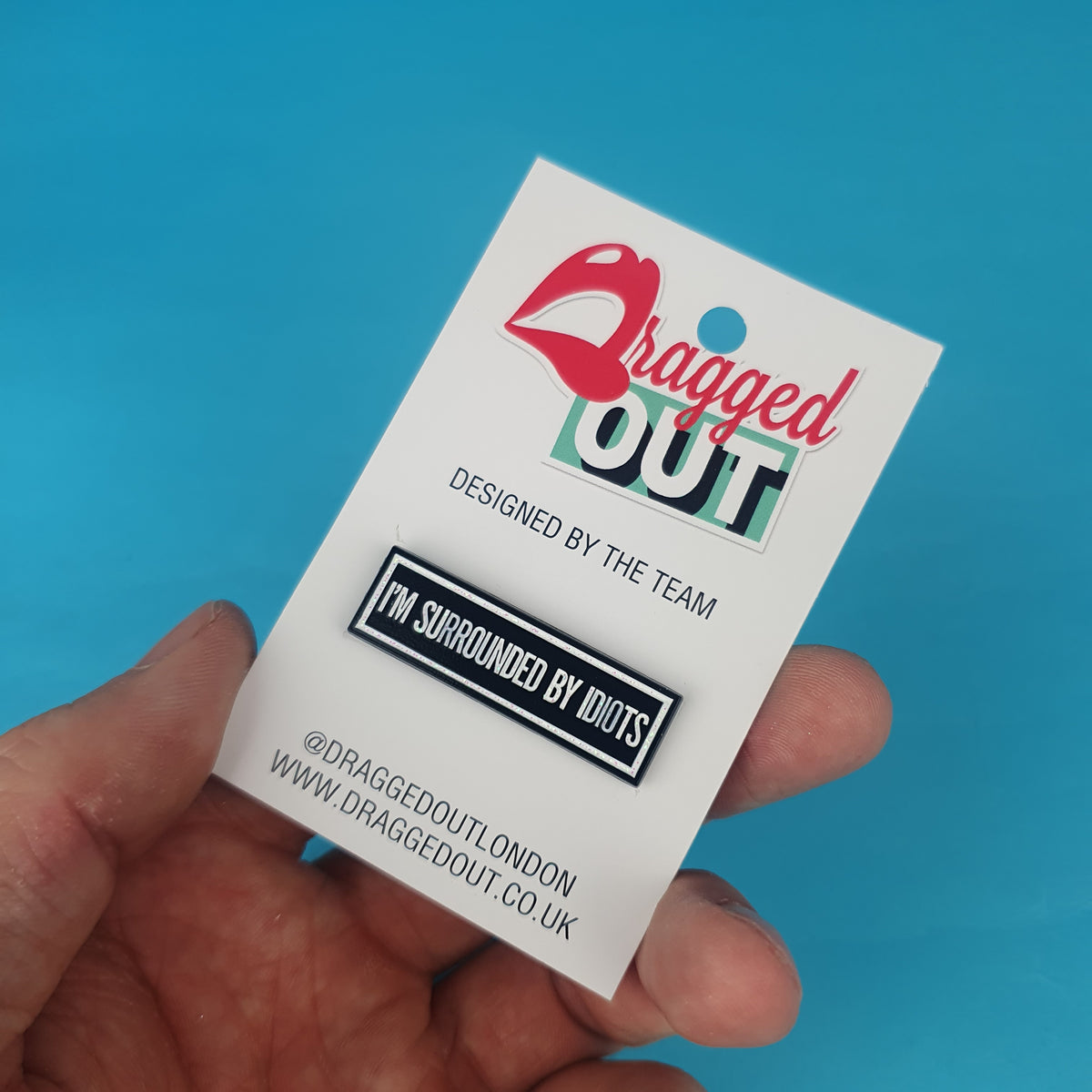 Im Surrounded By Idiots Pin Badge – Dragged Out